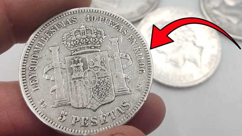 La moneda de 5 pesetas que vale para pagar la entrada de un piso nuevo ...